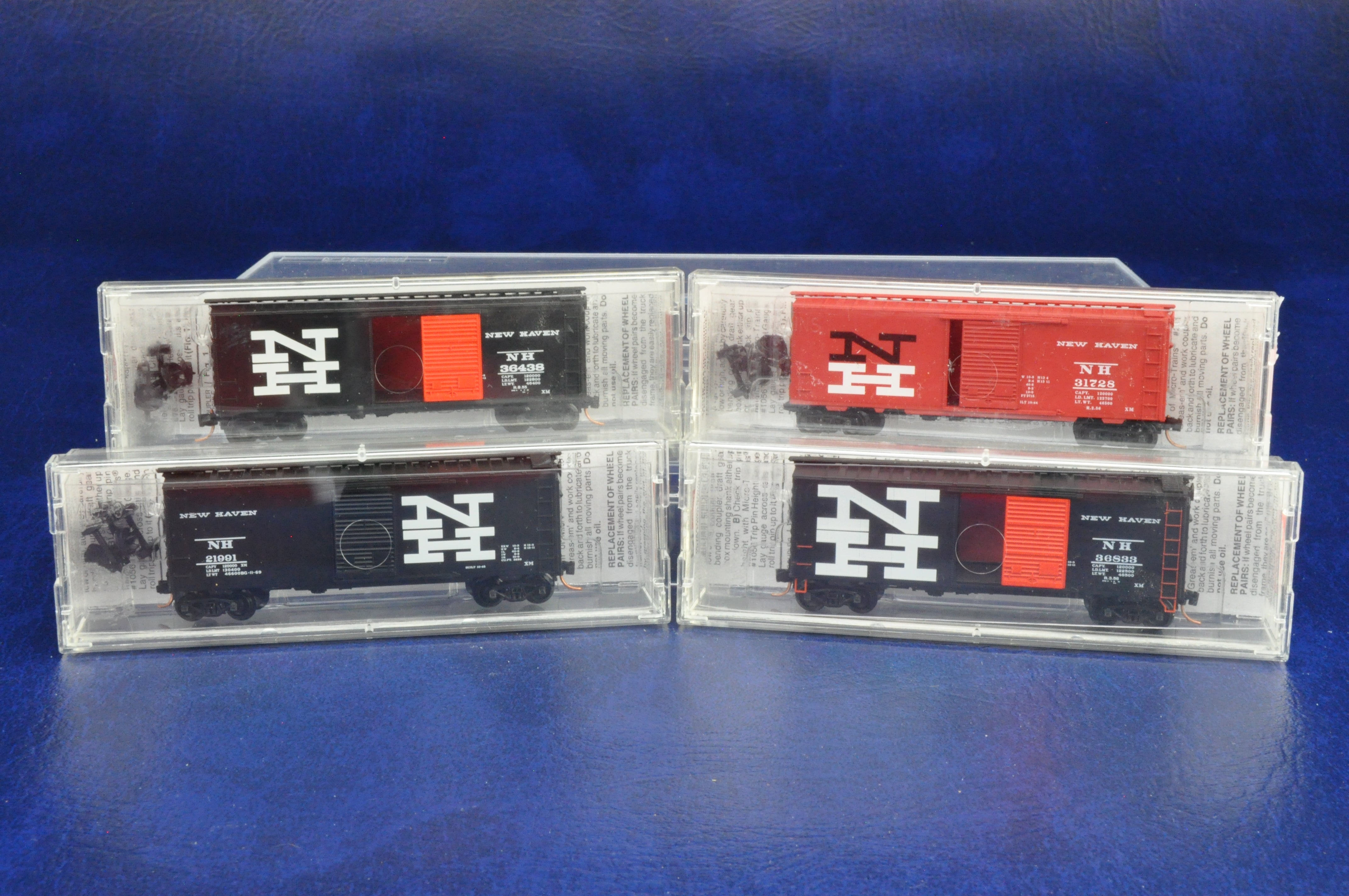 Micro Trains N Gauge Rake of 4 40ft Standard Single Door Box Cars - Ne